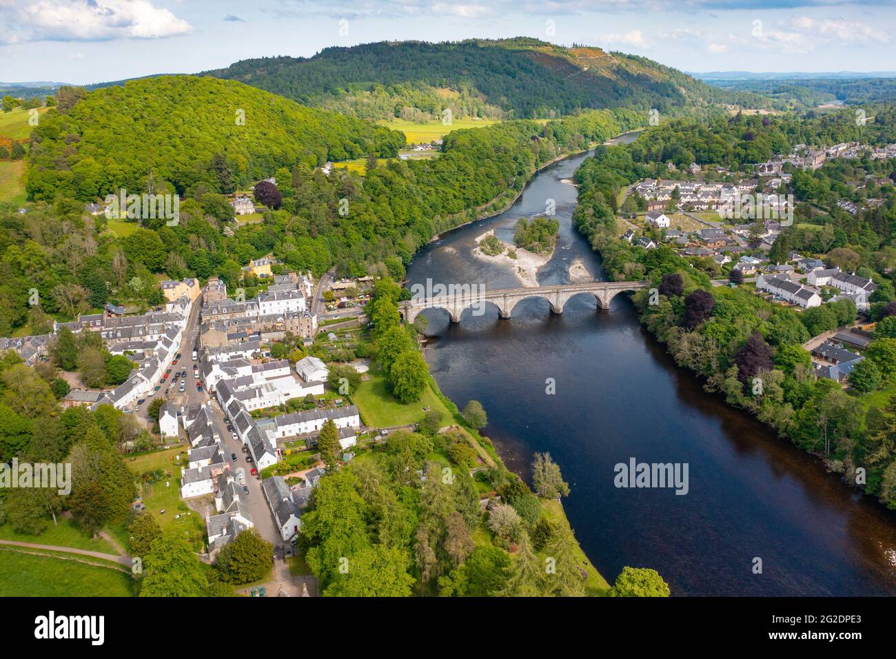 Aerial view from drone of village of Dunkeld beside River Tay and ...