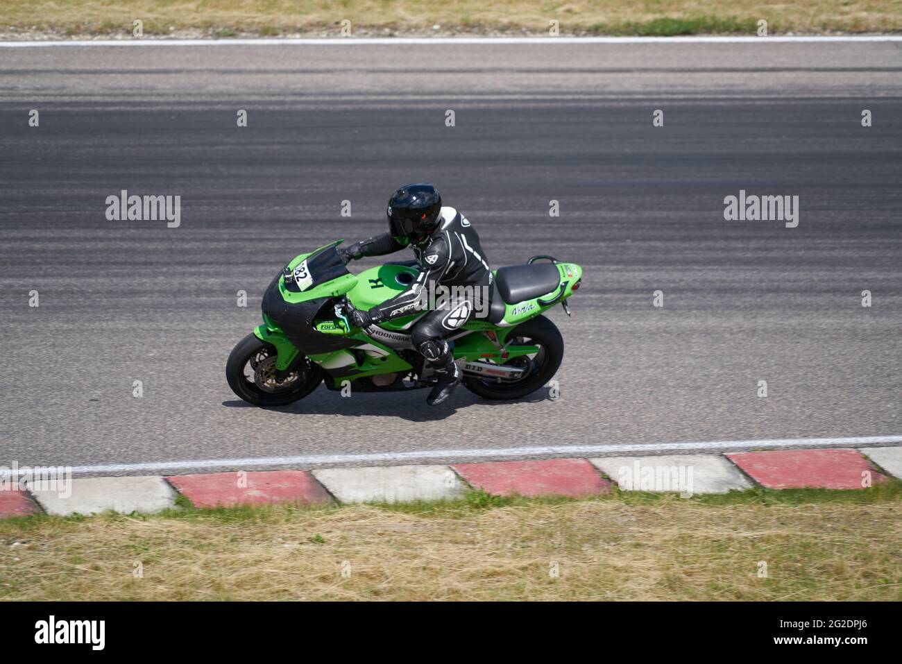 Lithuania, 05-06-2021 Fast green Japan Motorcycle at speed Stock Photo ...