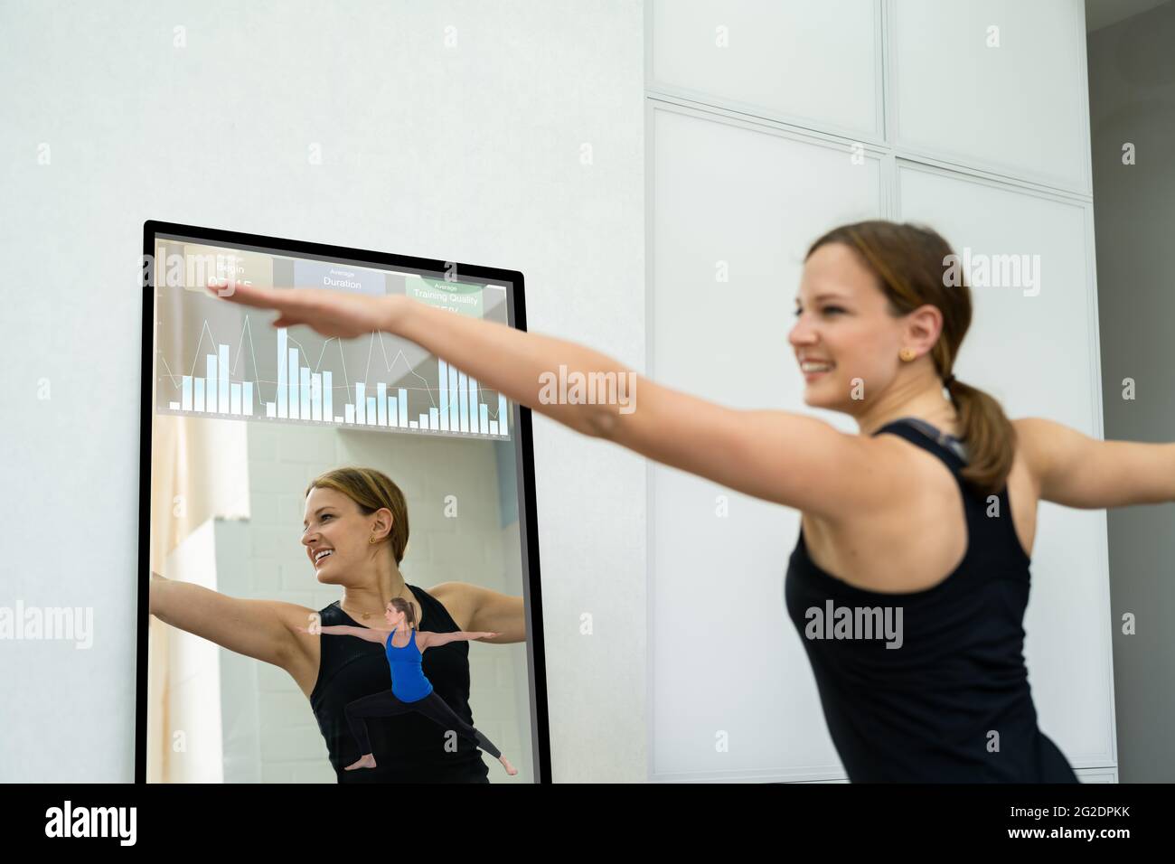 Smart Mirror Workout And Exercise Class. Women Doing Fitness Stock ...