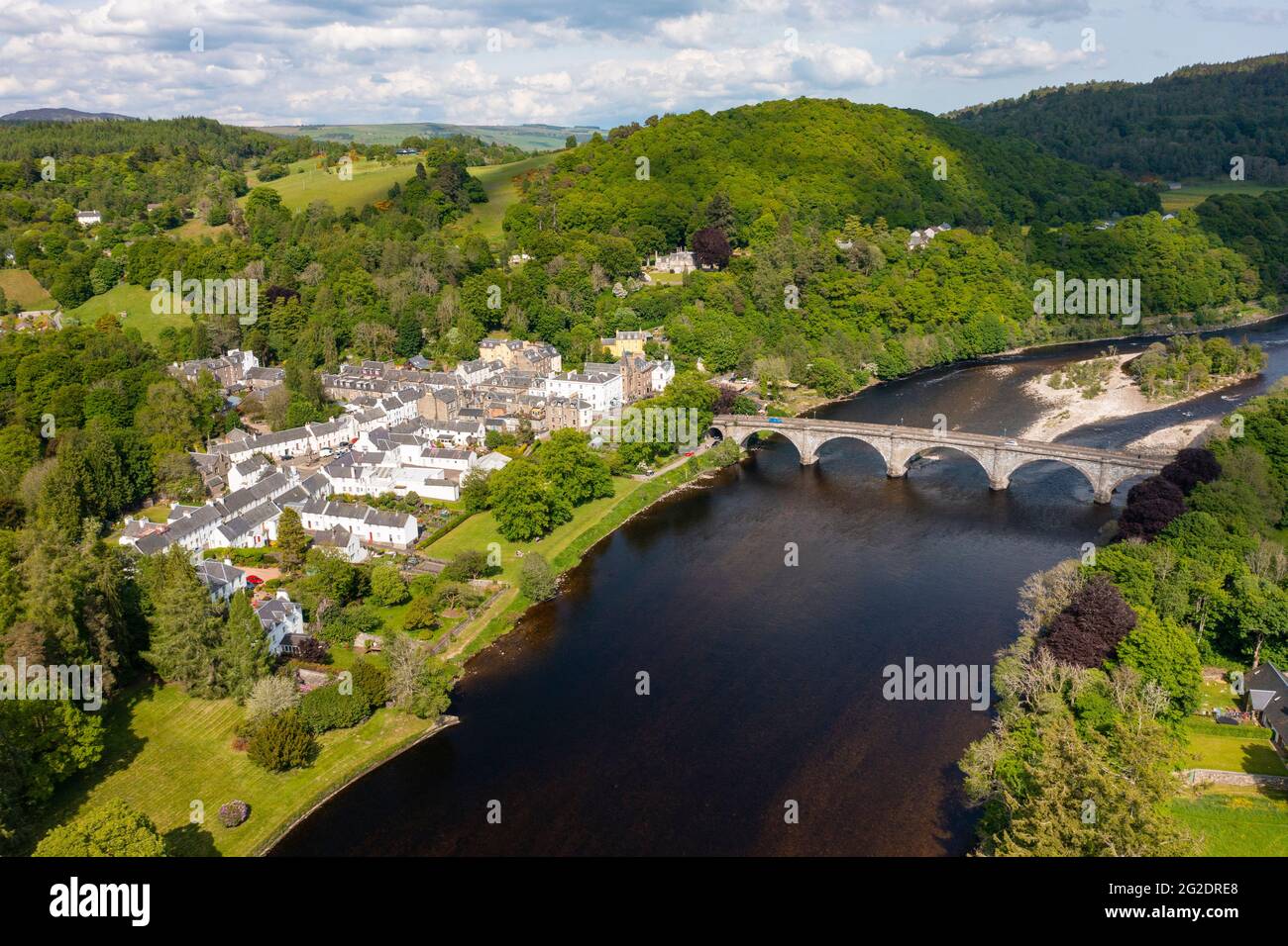 Aerial view from drone of village of Dunkeld beside River Tay and ...