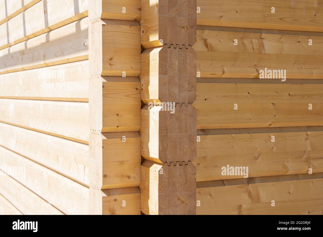 Fragment of a construction built of glued pine timber beams Stock Photo ...