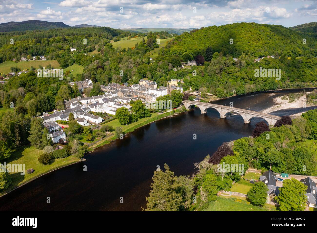 Aerial view from drone of village of Dunkeld beside River Tay and ...