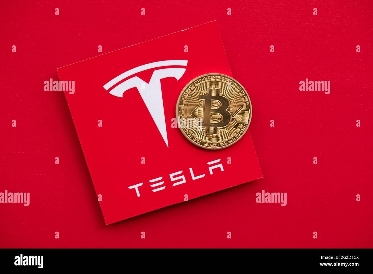LONDON, UK - June 2021: Bitcoin cryptocurrency on a Tesla electric ...