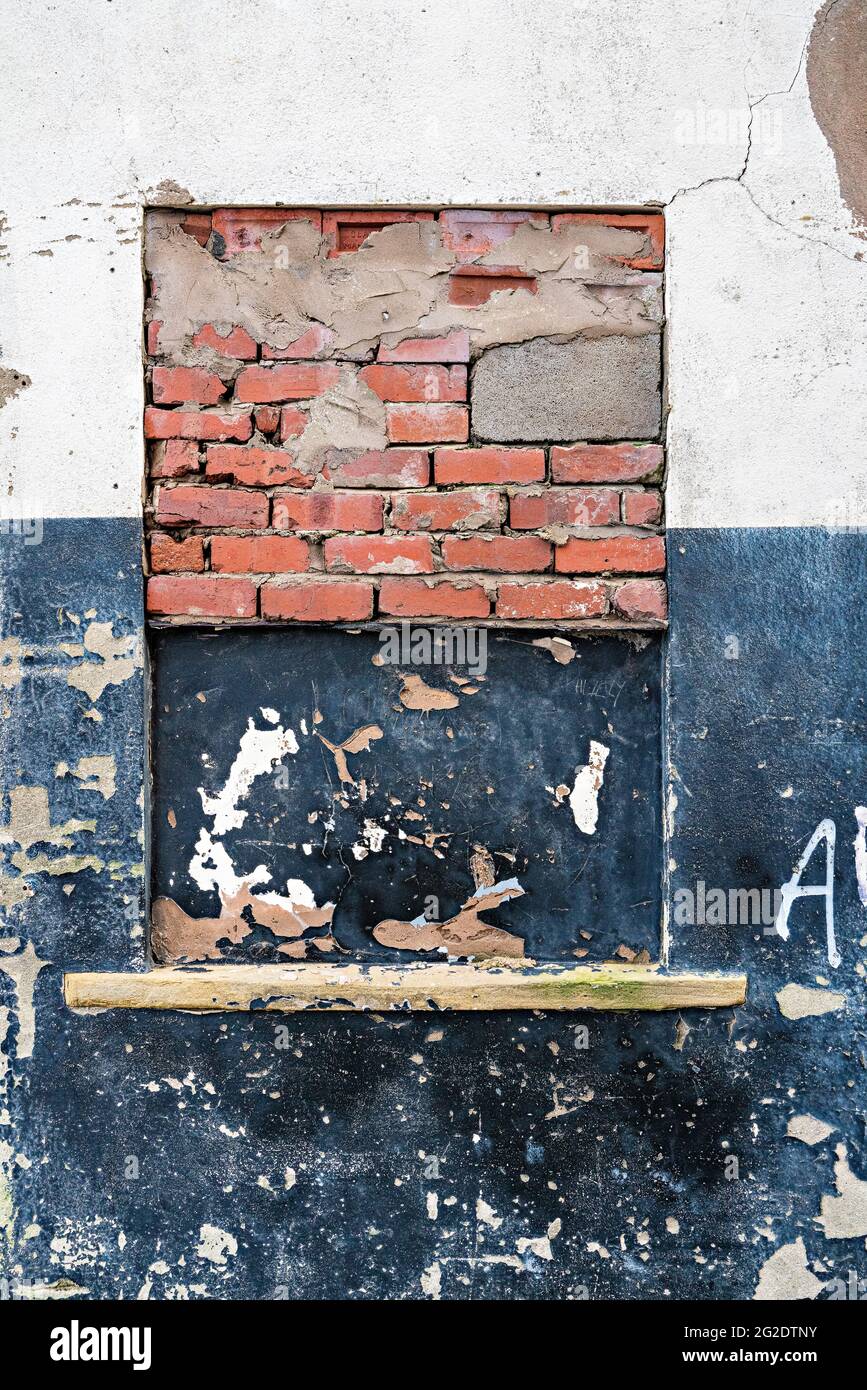 Bricked up window in back street Stock Photo - Alamy