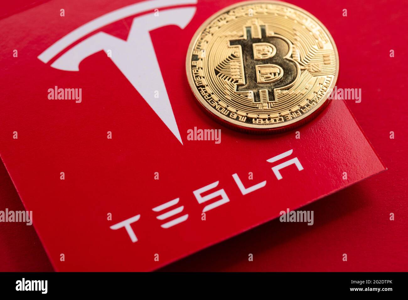LONDON, UK - June 2021: Bitcoin cryptocurrency on a Tesla electric ...