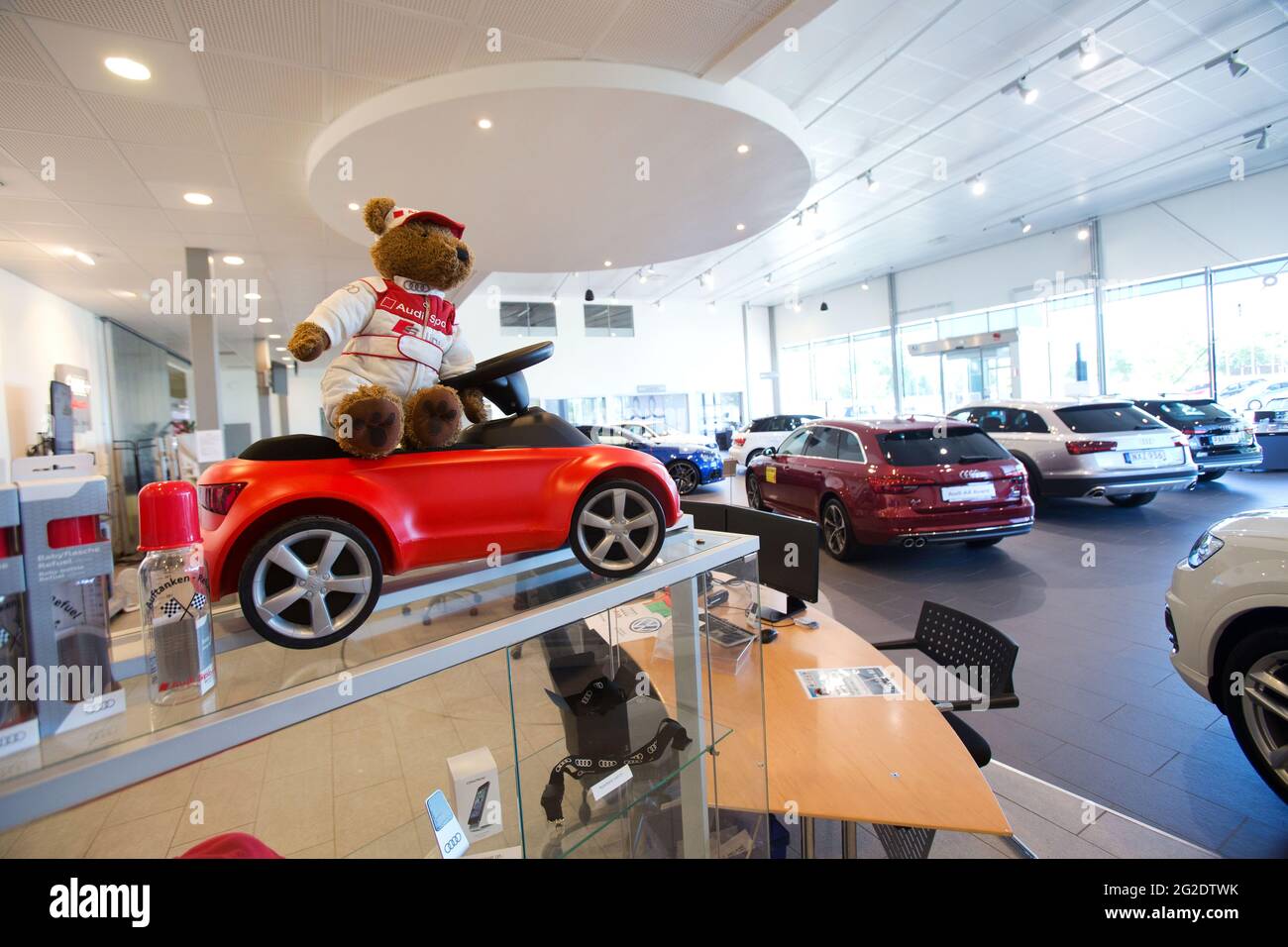 Car sales of Audi in a car showroom Stock Photo - Alamy