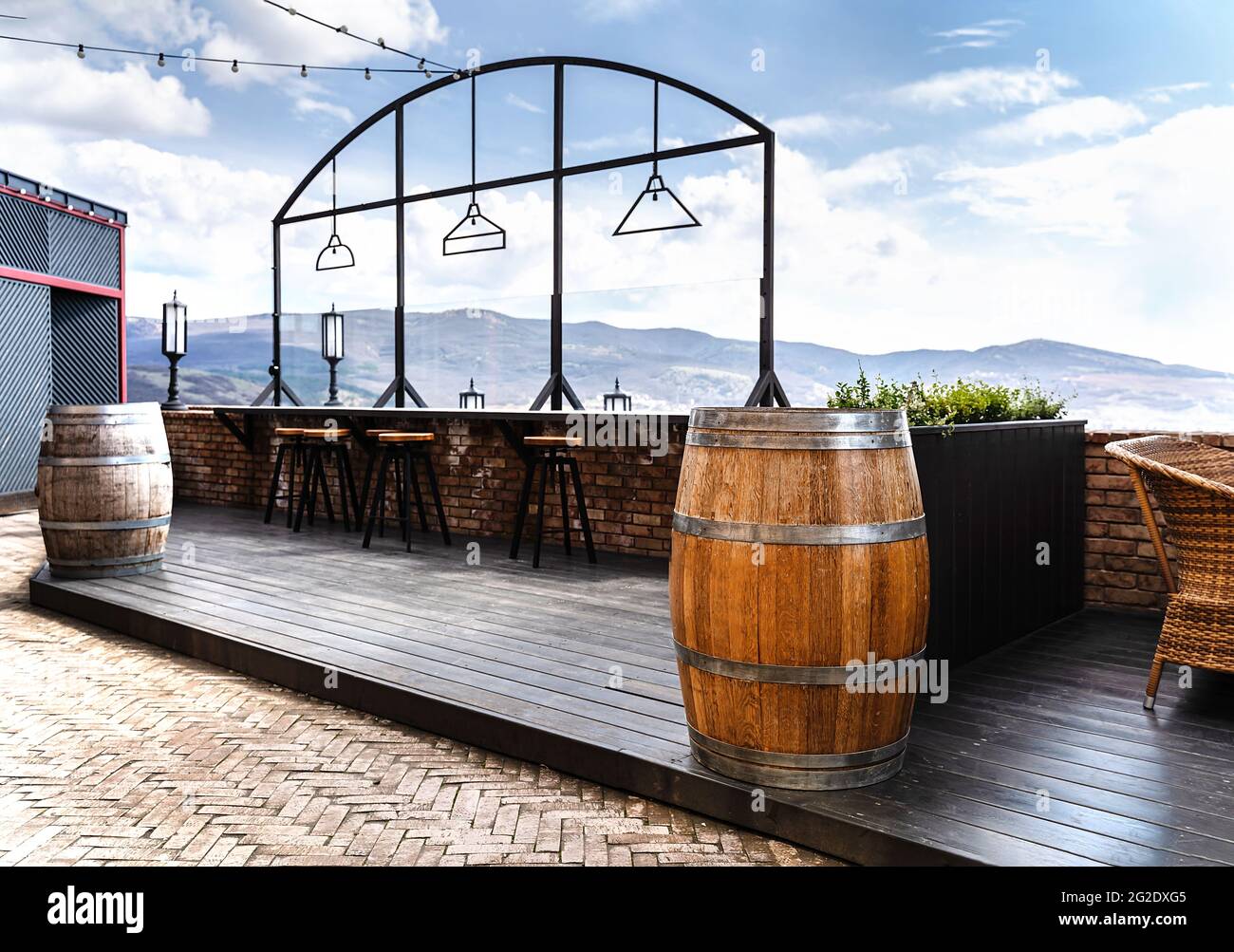 Italian street cafe background in vintage style with mountains in the ...