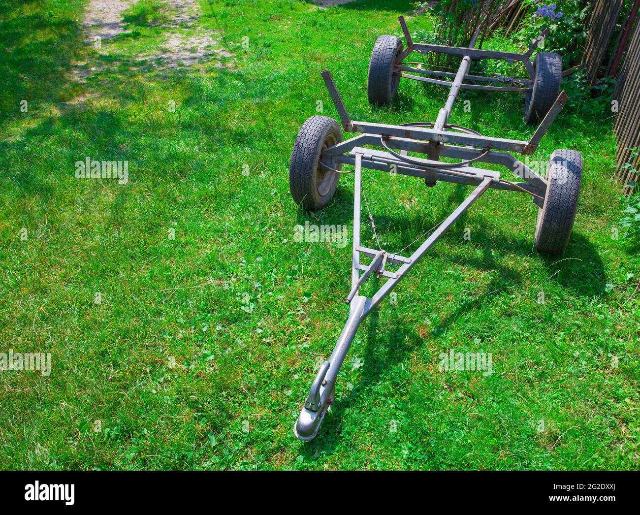 old metal carriage for tractor transportation Stock Photo - Alamy