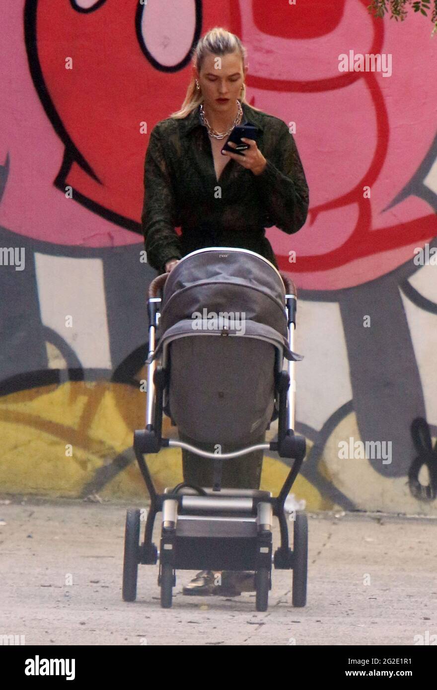New York City, USA. June 10 2021: Karlie Kloss seen walking baby Levi ...