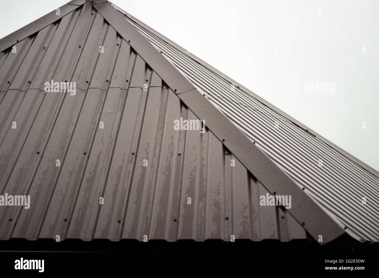 The roof of the house. Roof slope. Residential building roof covering ...