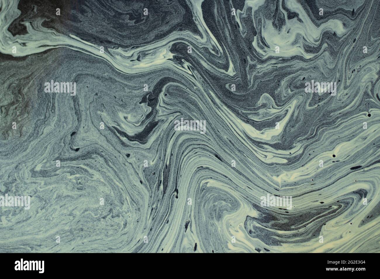 Pollen in a puddle. Beautiful stains in the water. Brownian motion of ...