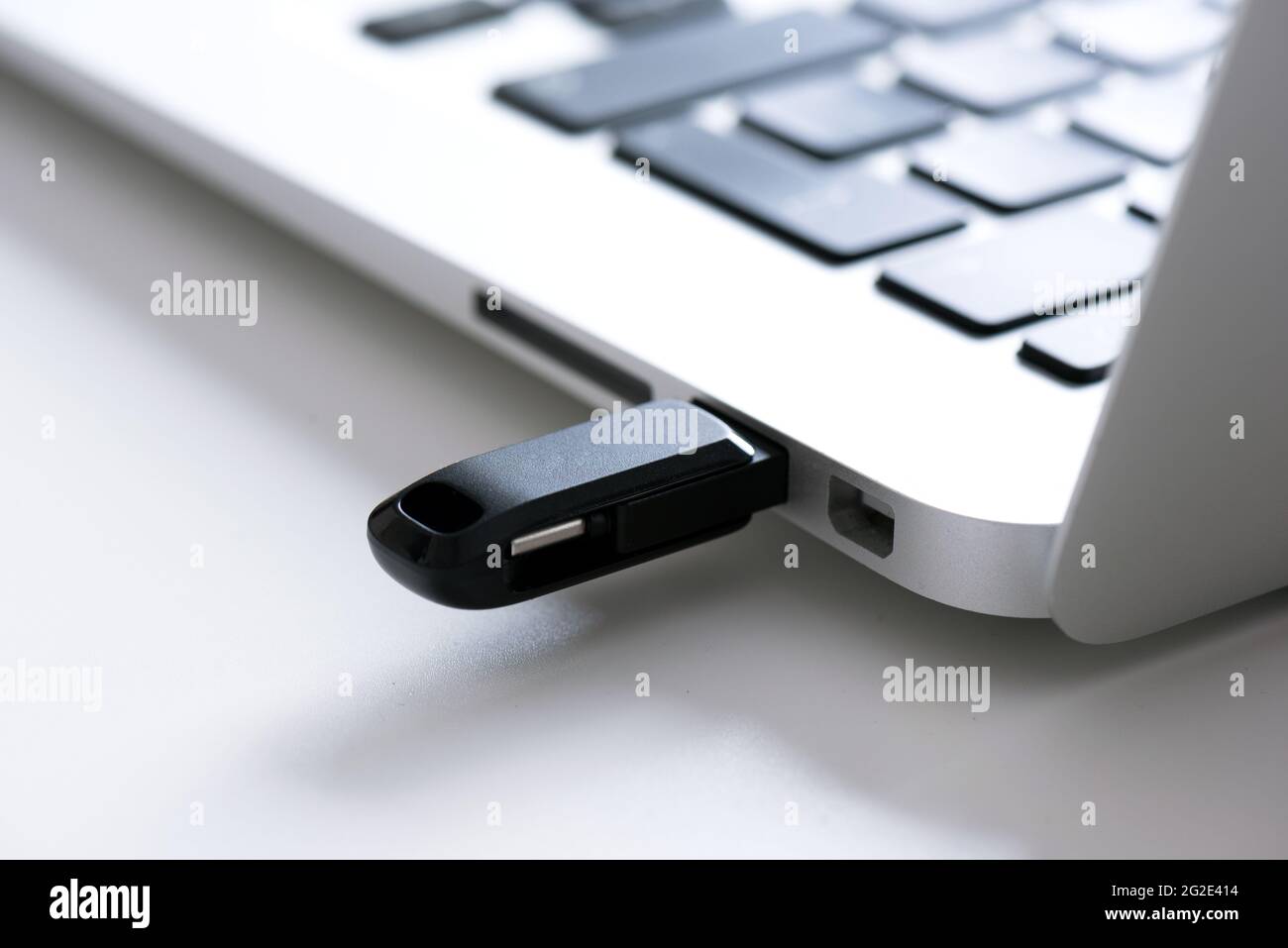 USB flash drive connected to the laptop's usb socket. Pendrive, flash ...