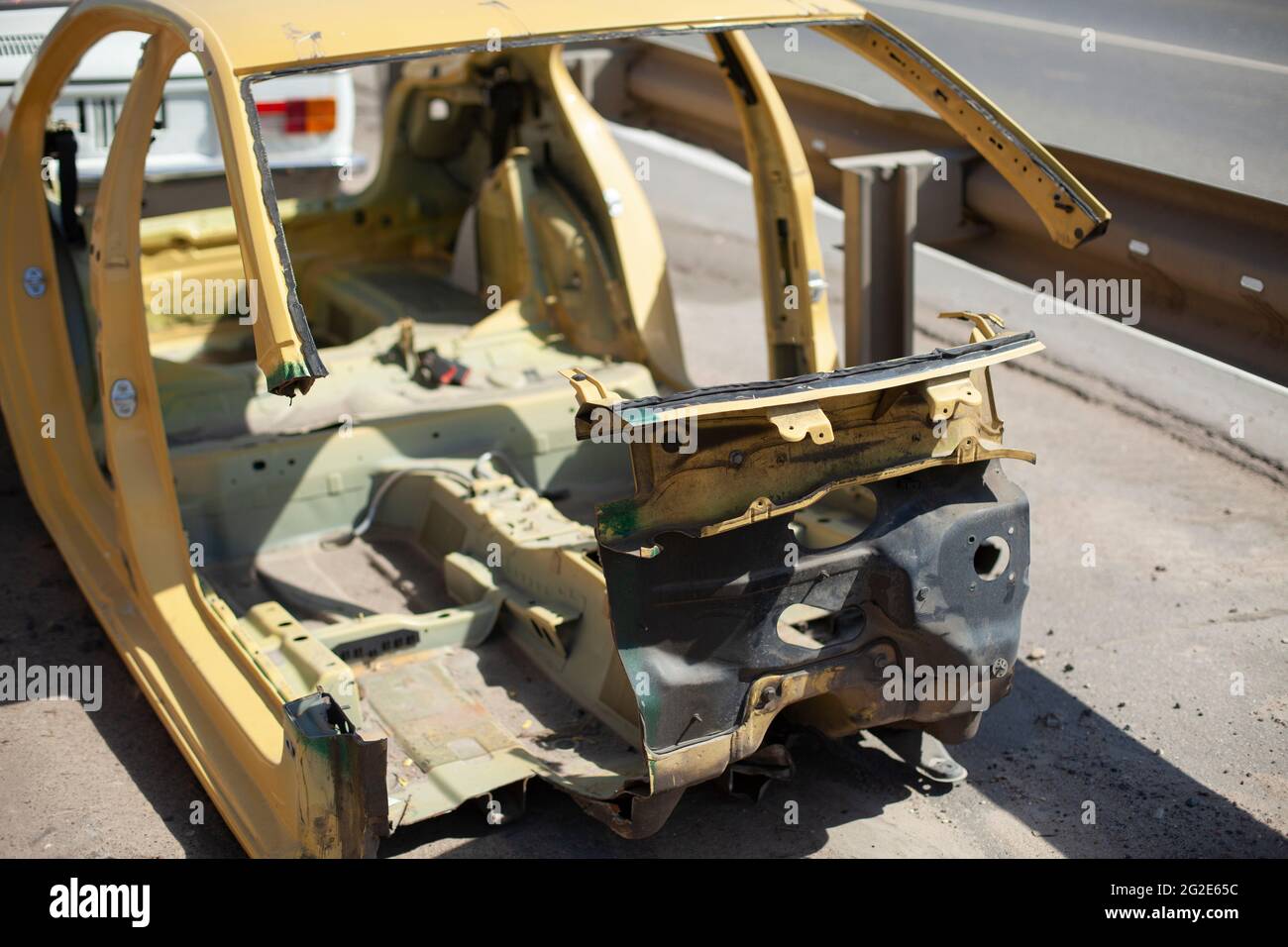 Disassembled car frame on the street. Car after an accident. Unsuitable ...