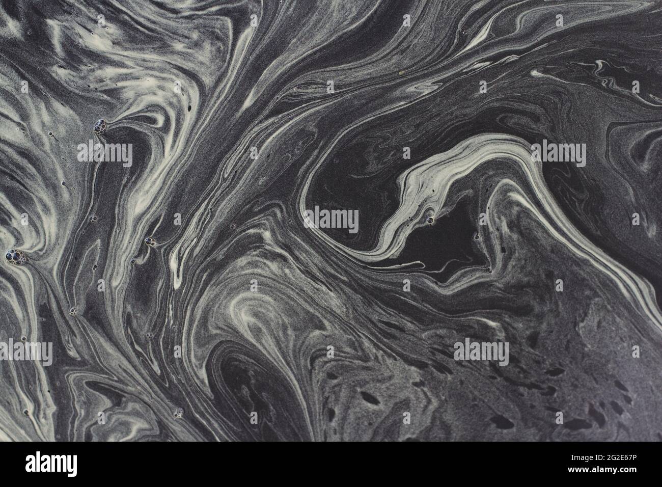 Pollen in a puddle. Beautiful stains in the water. Brownian motion of ...