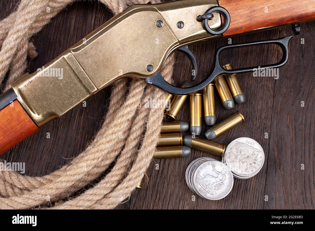 Old west gun - lever-action repeating rifle with bullets and silver ...