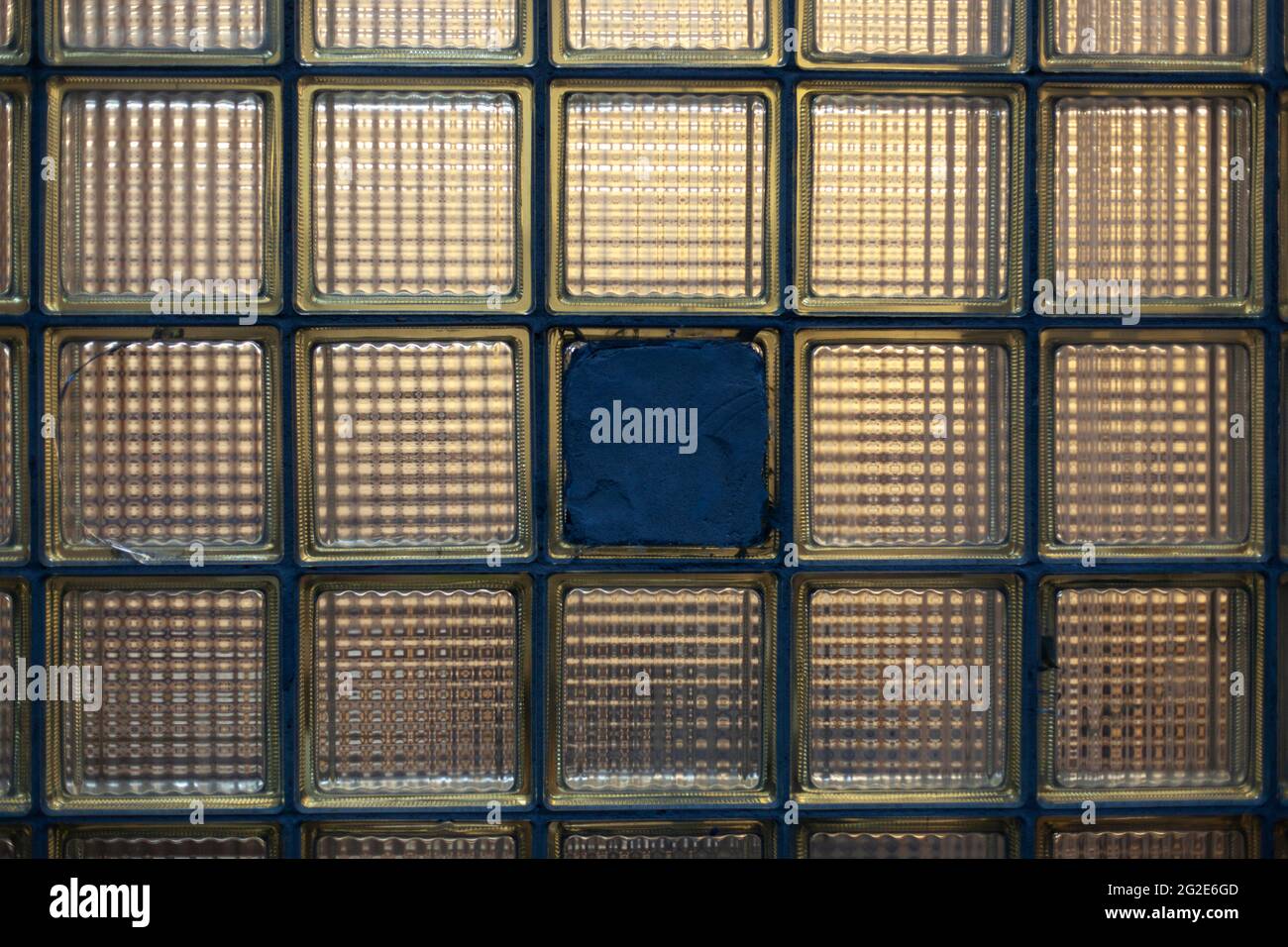 Tiled glass in the building. Thick glass does not allow much light to ...