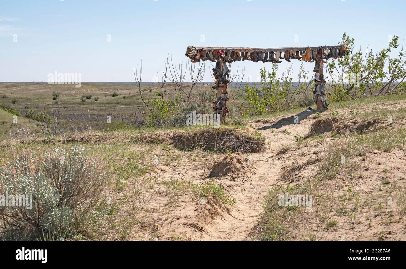 Old cowboy boots nailed to a rail in the Great Sandhills (Sand Hills ...