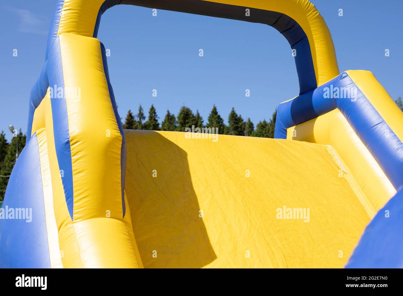 Inflatable obstacle course for fun. Inflatable structure in the park. A ...
