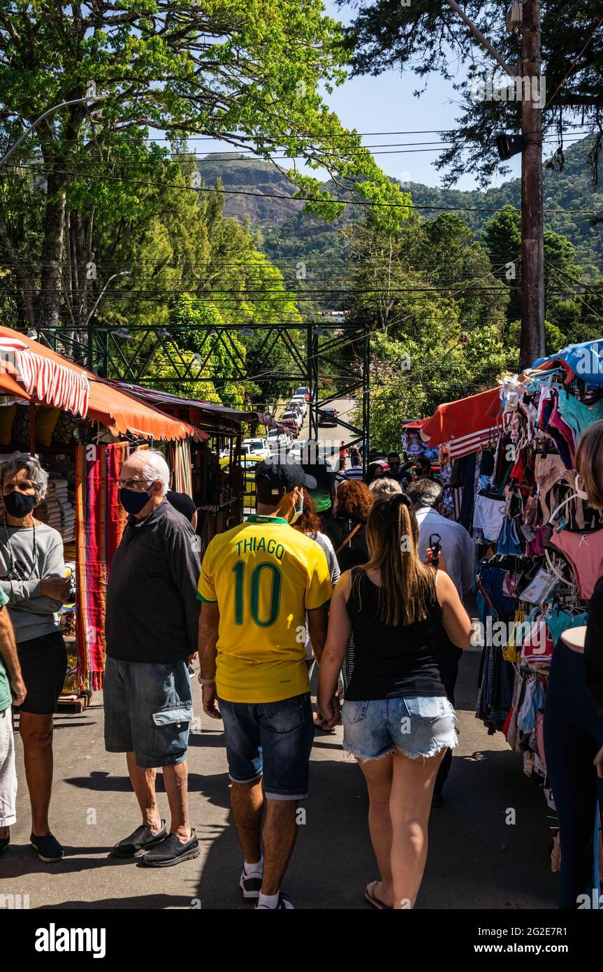 A crowded corridor full of costumers in Alto Fair, a public market ...