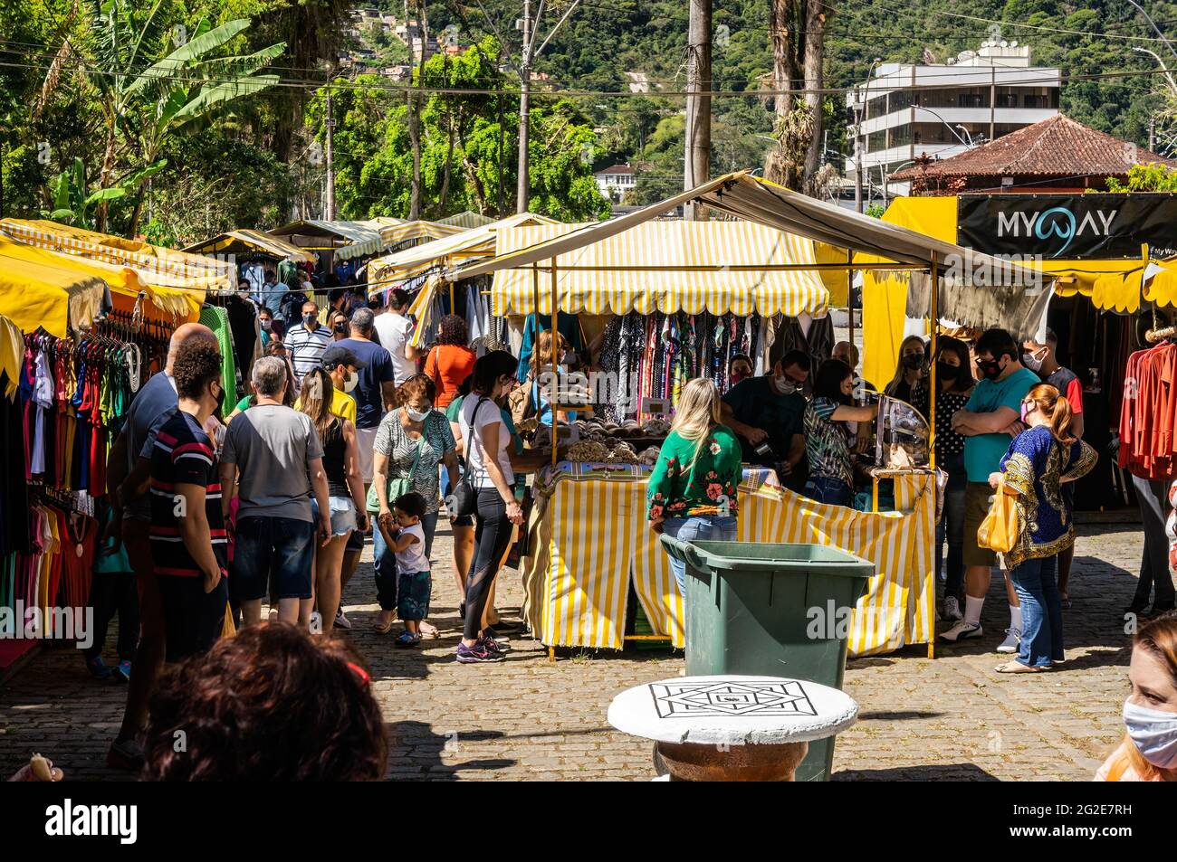A crowded section full of costumers in Alto Fair, a public market ...