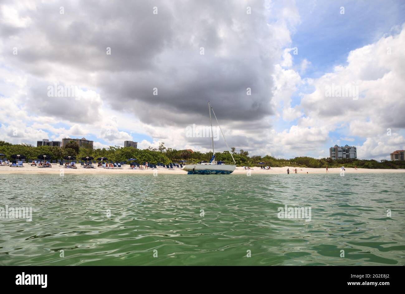 Shipwrecked sailboat on the beach of Clam Pass in Naples, Florida seen ...