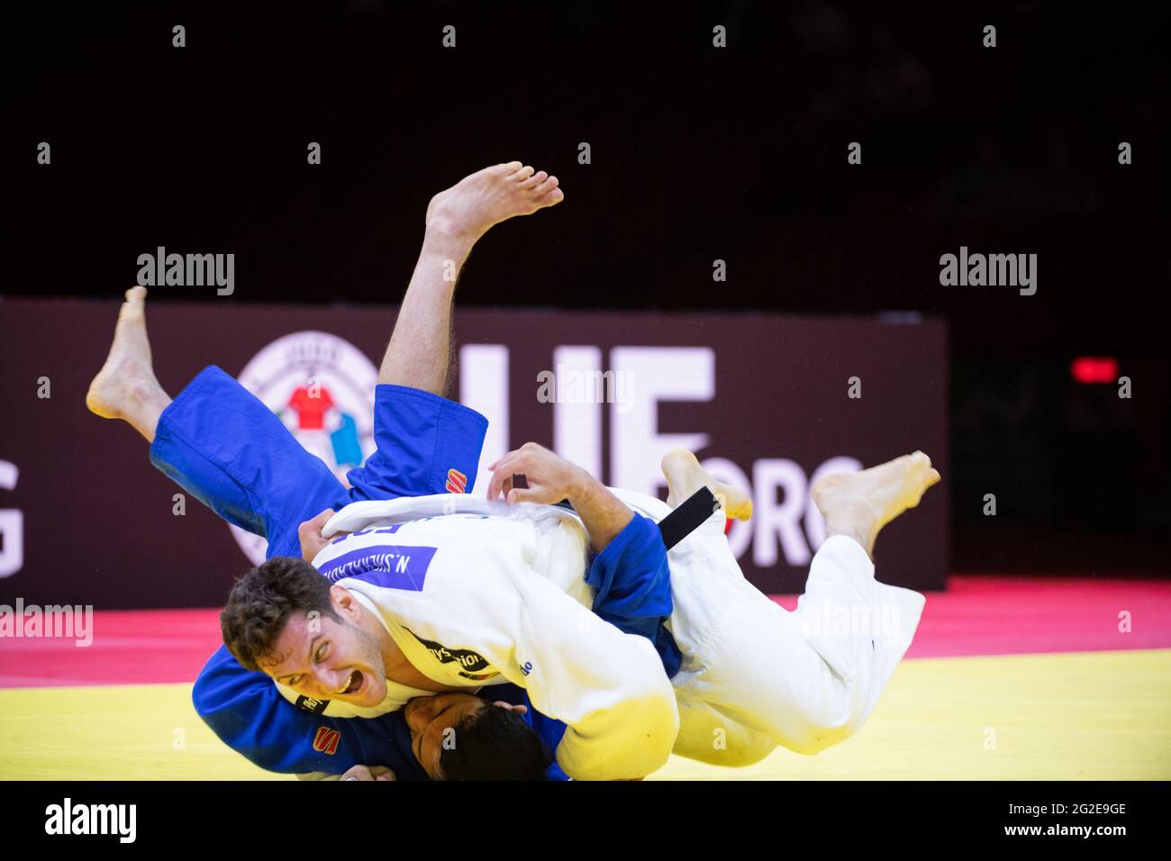 Spain's Nikoloz Sherazadishvili, men -90 kg, white, vs Uzbekistan's Davlat Bobonov, men -90 kg ...