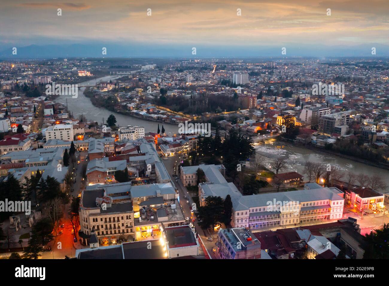 Aerial view of illuminated Kutaisi cityscape on Rioni River Stock Photo ...