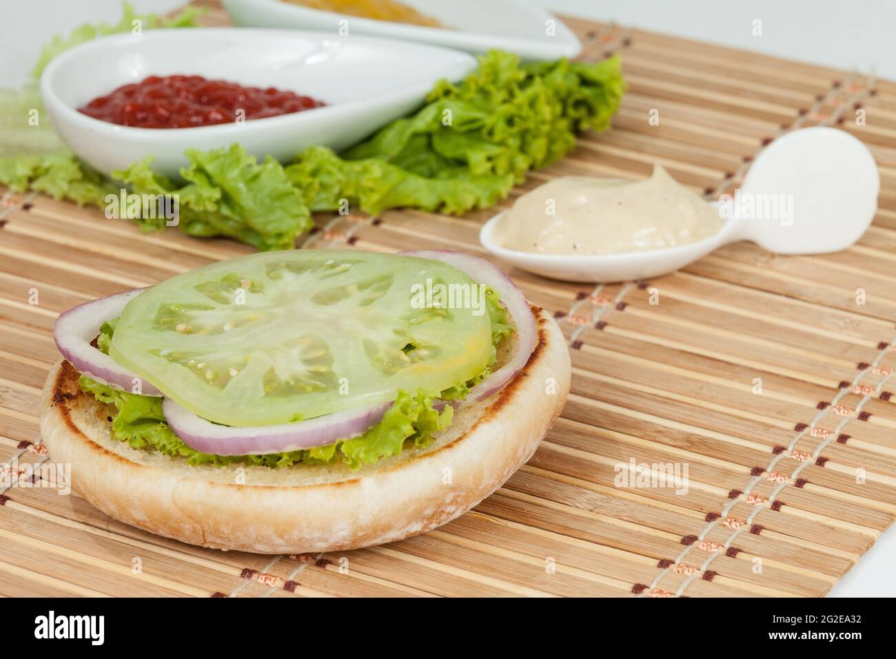 Slice Of Bread For Hamburger With Vegetables: Green Tomato, Lettuce And ...