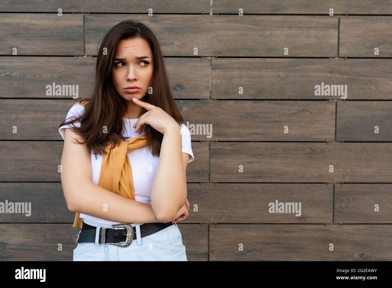 Portrait of touchy sad upset offended resentful young brunet woman ...