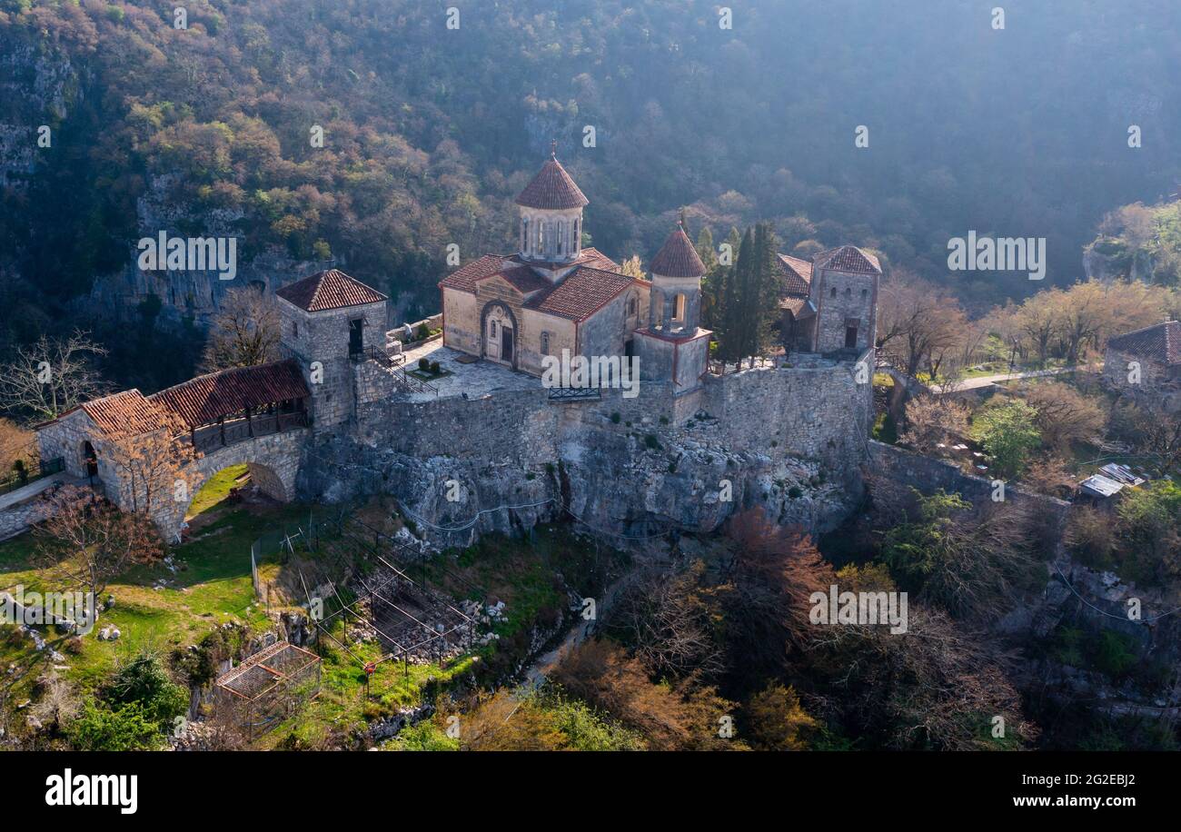 Aerial view of Georgian Orthodox Motsameta monastery on stone cliff ...