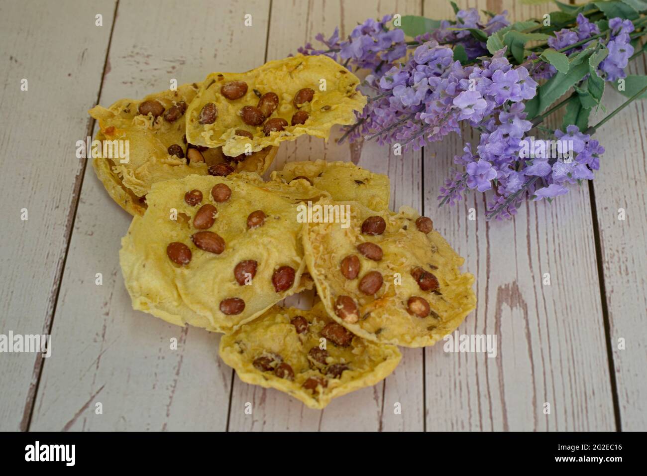 A serving of rempeyek. Rempeyek is a traditional cookies during Hari ...