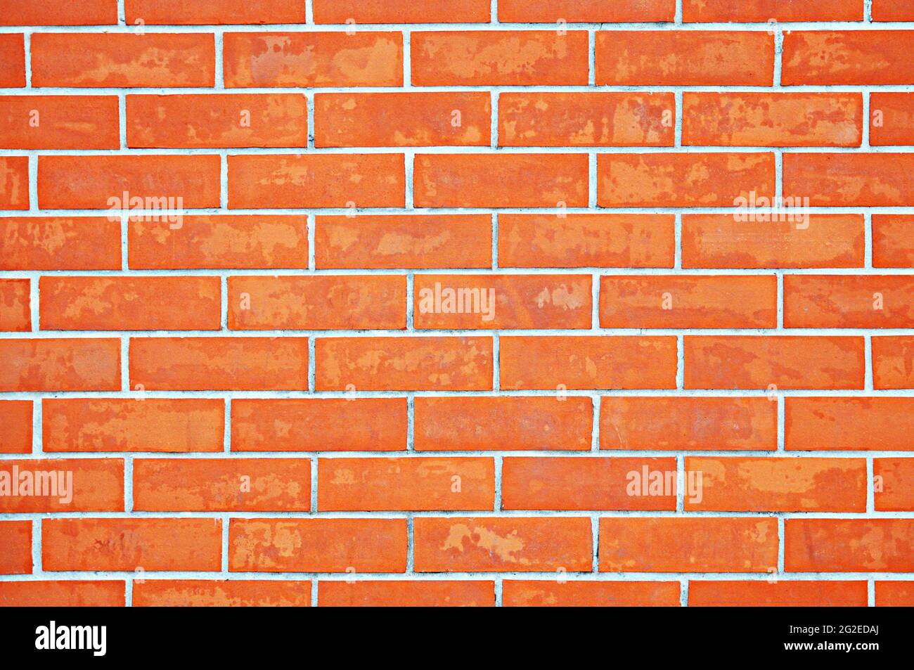 Clay brick wall - abstract background Stock Photo - Alamy