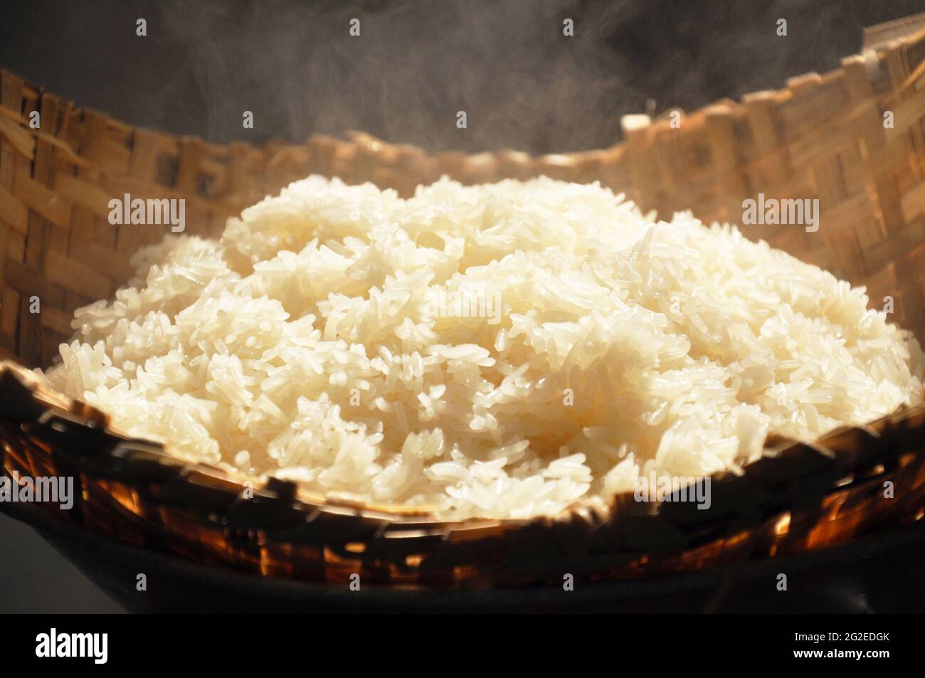 Cooked sticky rice in wooden steamer Stock Photo - Alamy