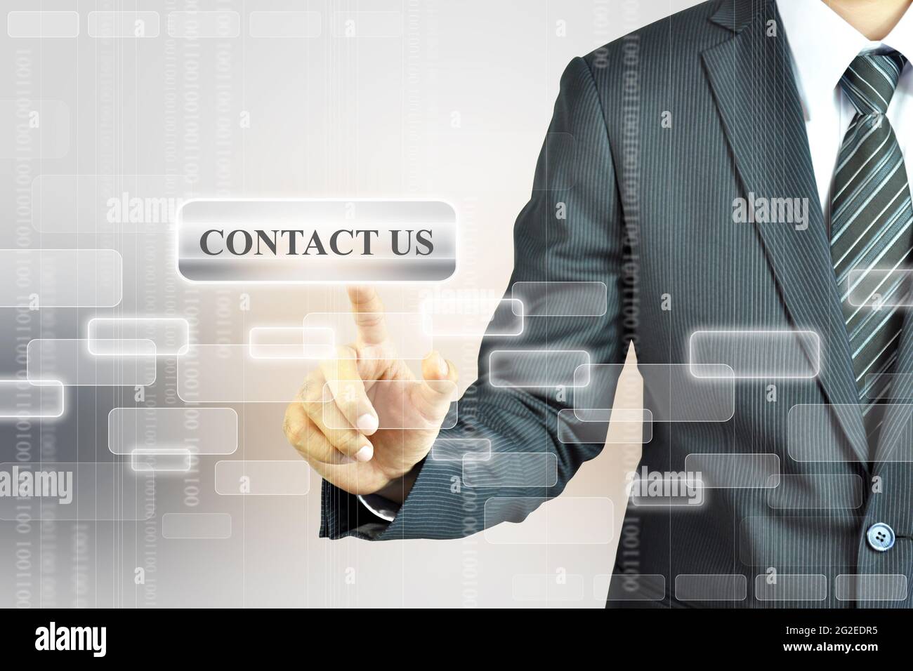 Businessman pushing CONTACT US sign Stock Photo - Alamy