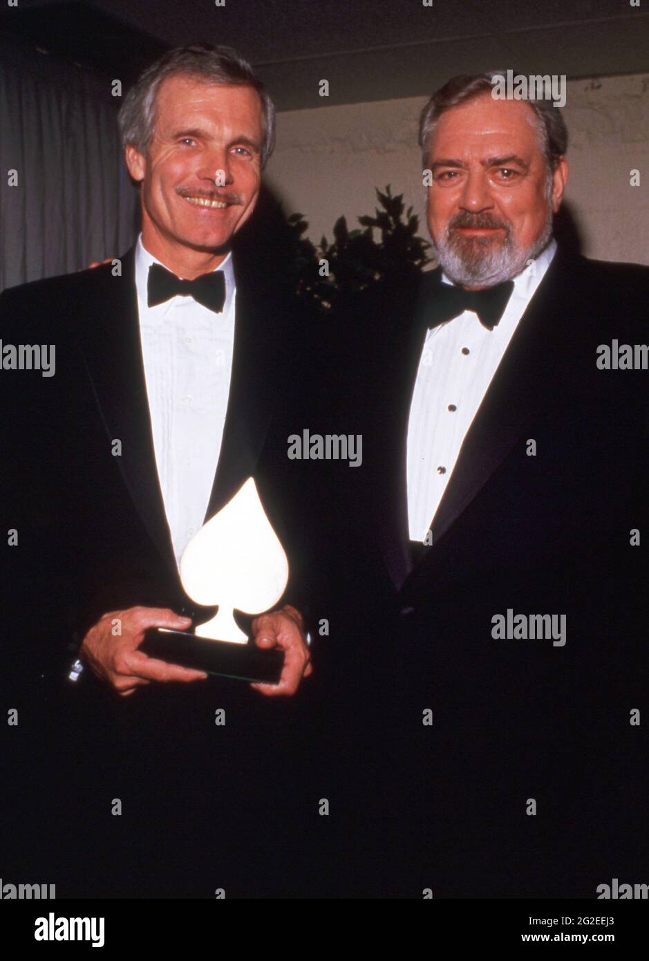 Ted Turner and Raymond Burr 1987 Credit: Ralph Dominguez/MediaPunch Stock Photo - Alamy