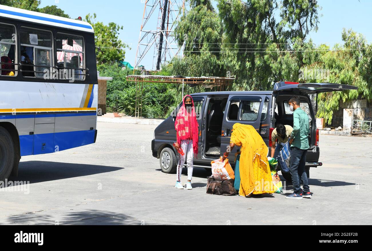 Asian women at a bus stop hi-res stock photography and images - Alamy