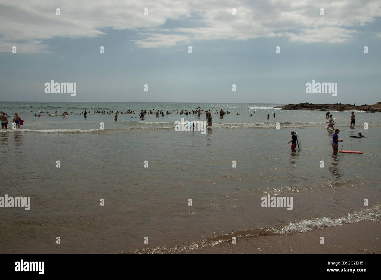 Holiday makers enjoying the sea and sun at scottburgh, south africa ...