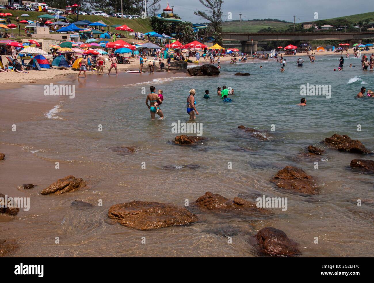Holiday makers enjoying the sea and sun at scottburgh, south africa ...