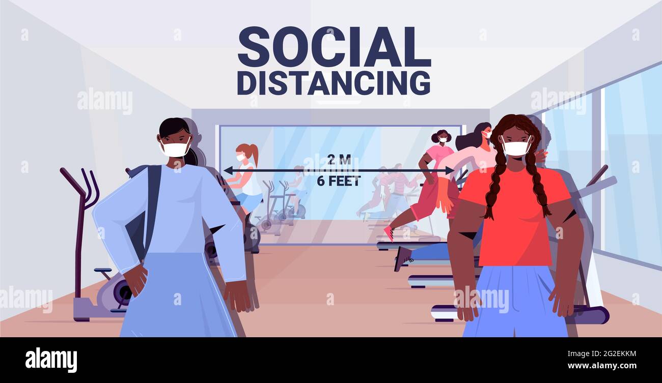 mix race girls in protective masks working out women keeping distance ...