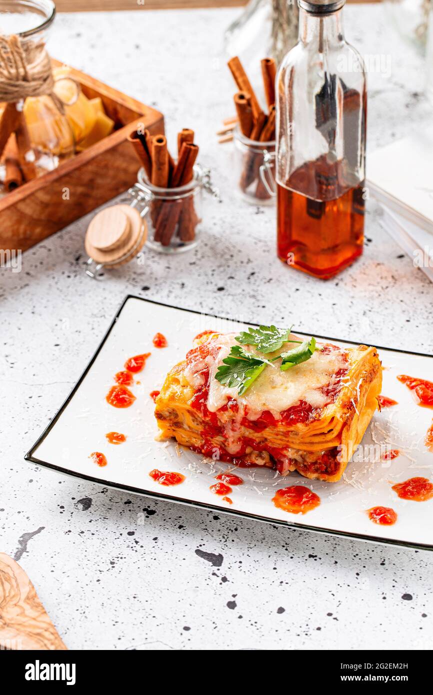 Side view on italian lasagna dish Stock Photo - Alamy
