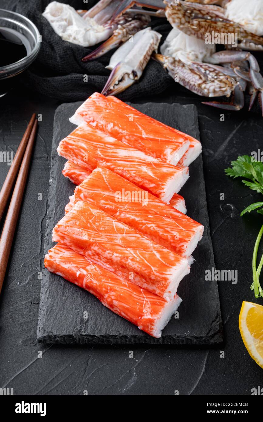Asian snack surimi set, on stone board, on black background Stock Photo ...