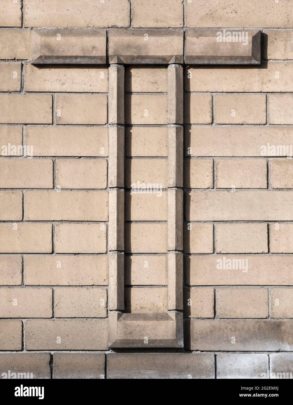 Large letter T composed of light clinker Stock Photo - Alamy