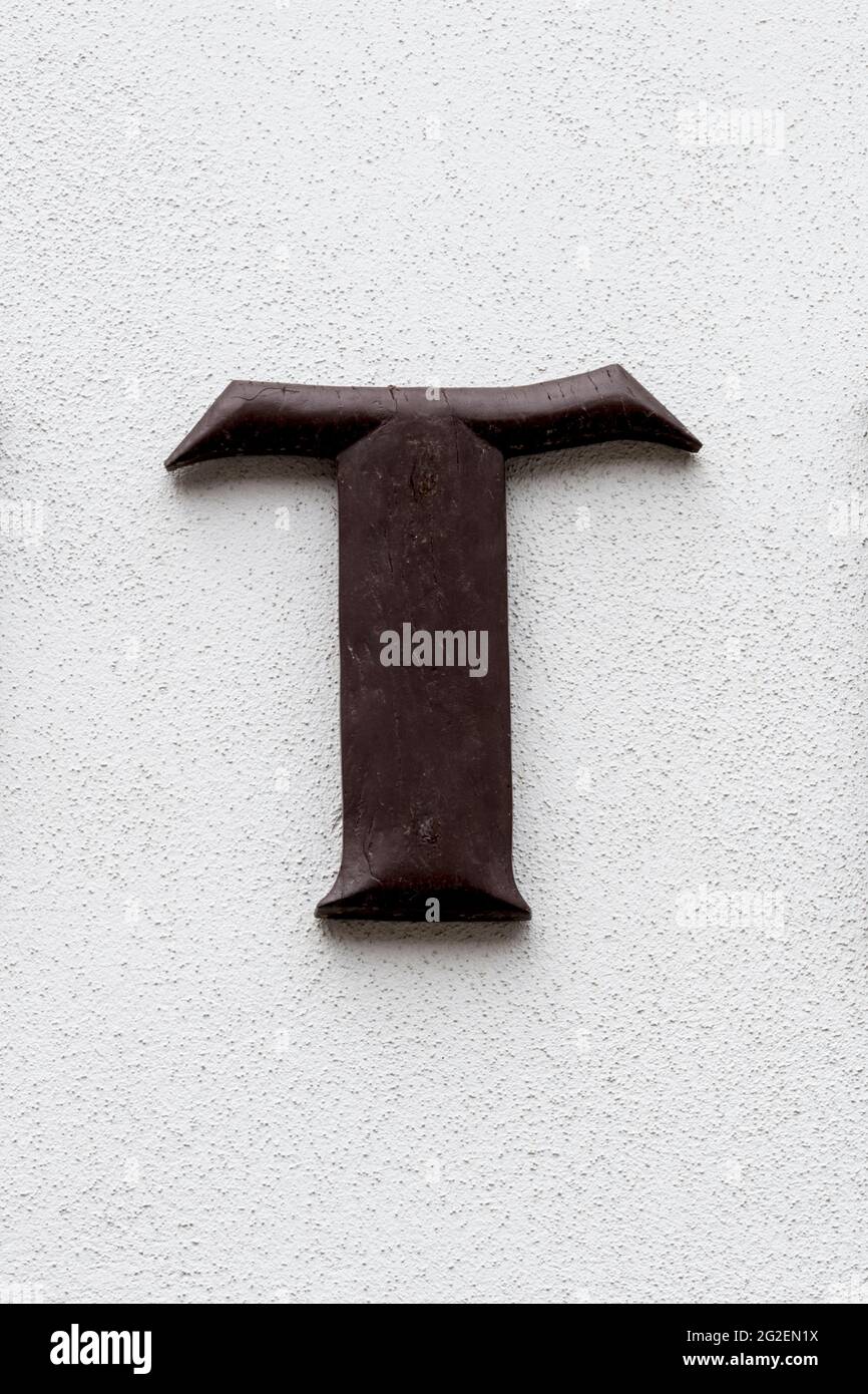 Brown wooden letter T of a historic advertising sign Stock Photo - Alamy