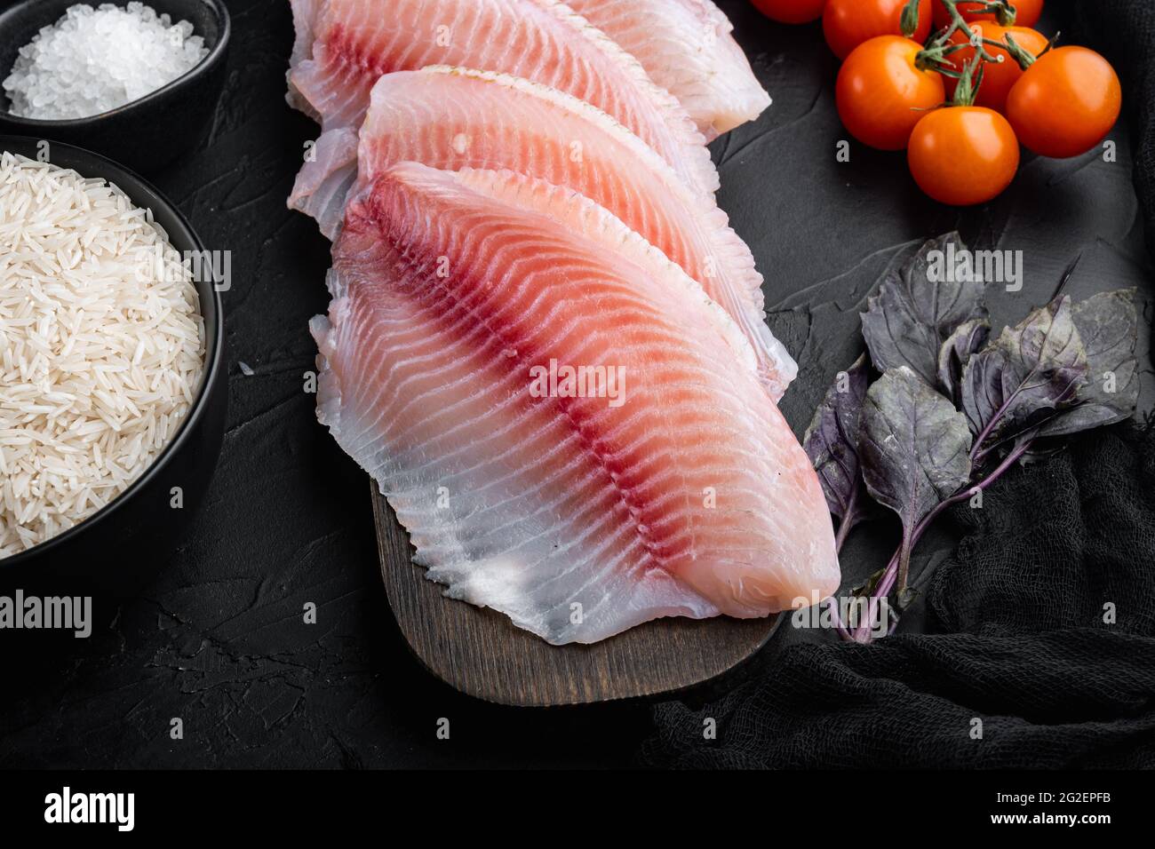 White fish fillet, with basmati rice and cherry tomatoes ingredients ...