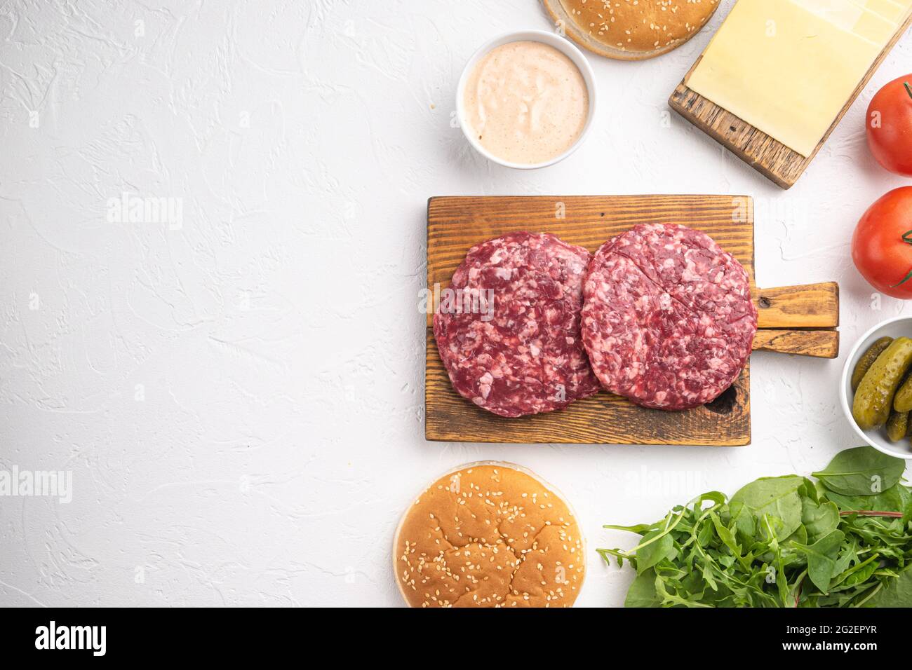 Beef burger ingredients set, on white stone background, top view flat ...