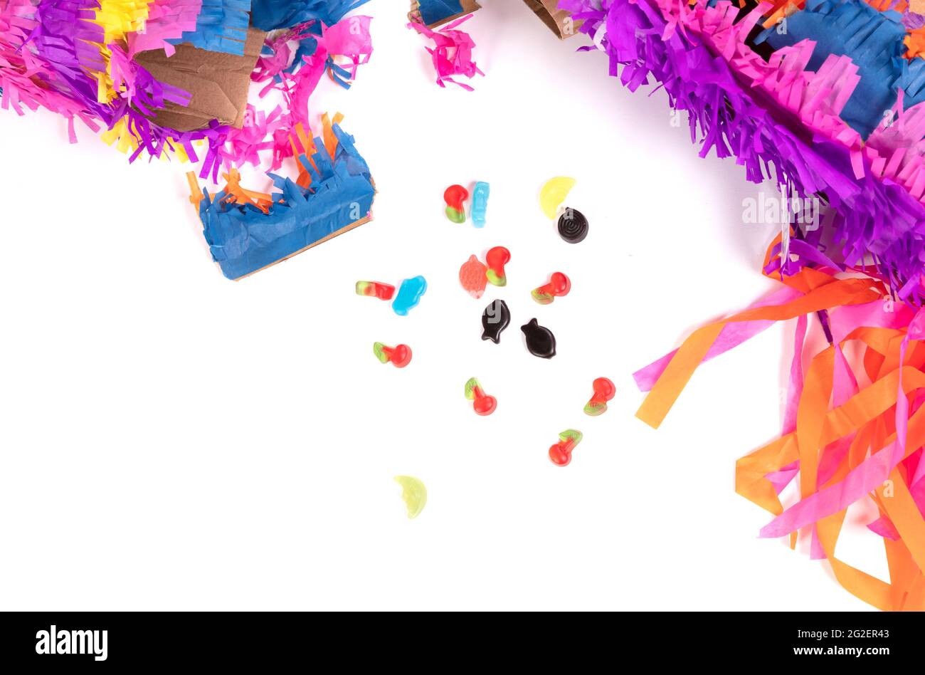 Broken colorful donkey pinata isolated on white background Stock Photo ...