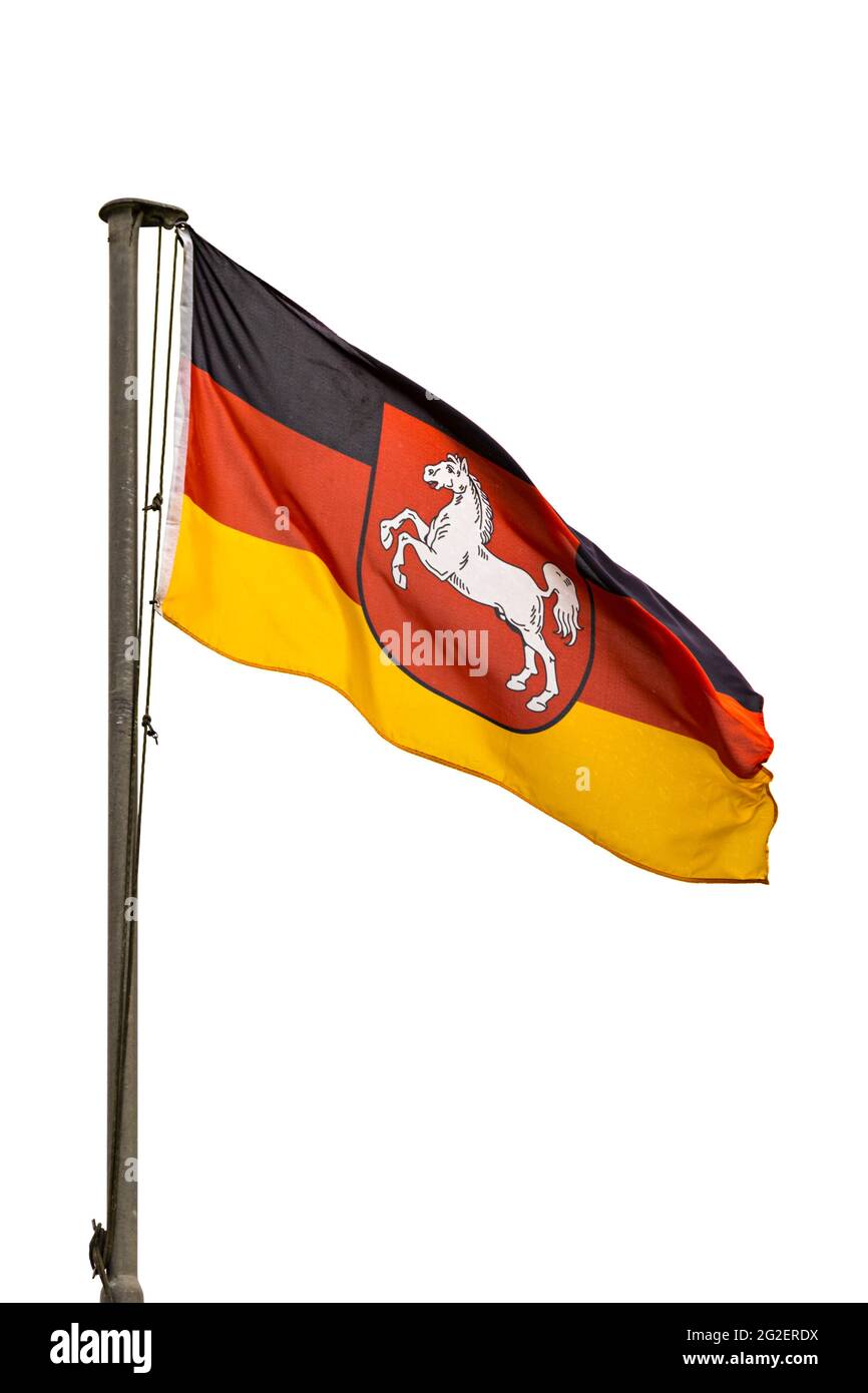 Flag of Lower Saxony on flagpole isolated on white background Stock ...