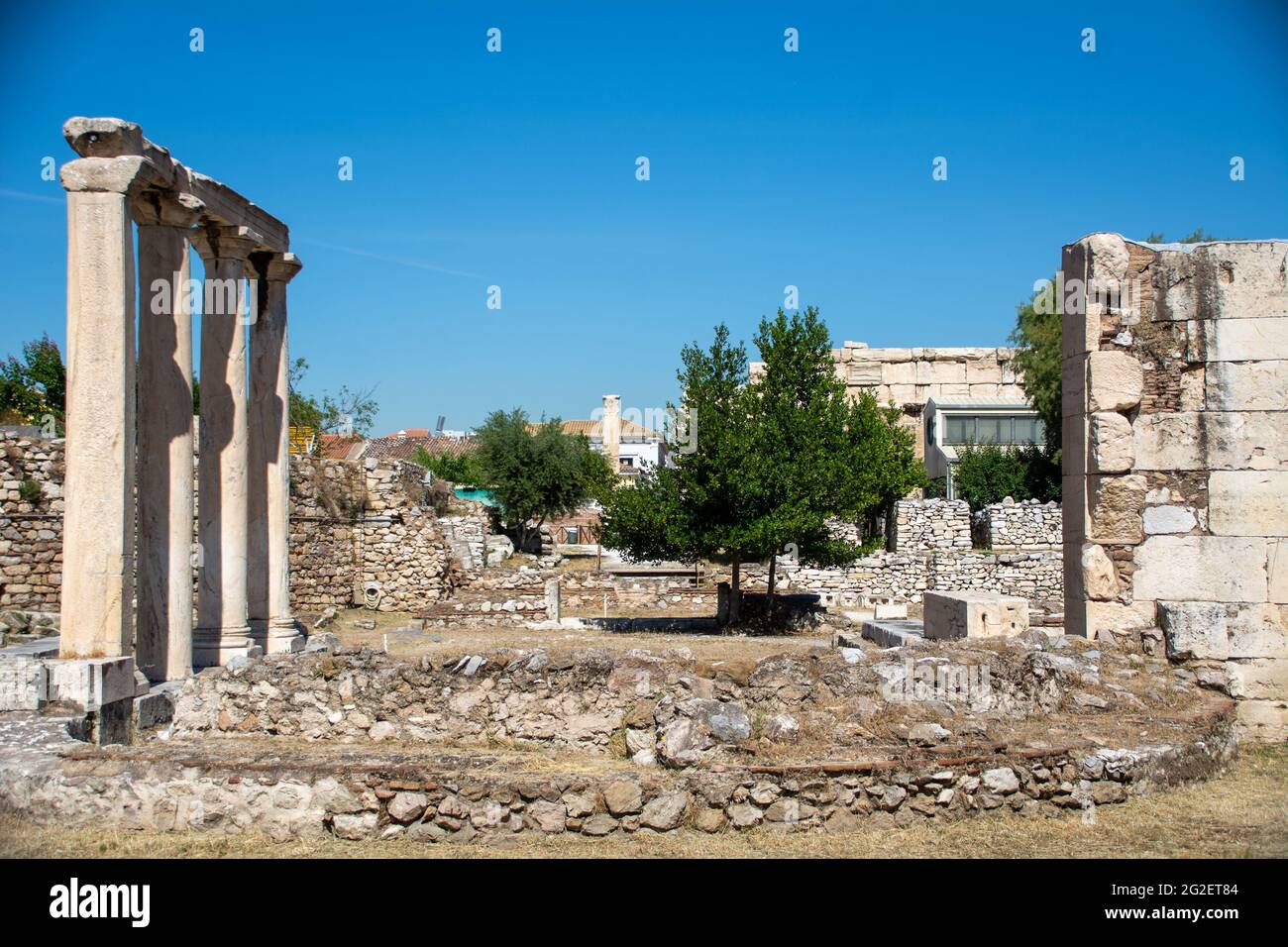 Ancient ruins in Hadrian's Library with a view to Acropolis in the ...