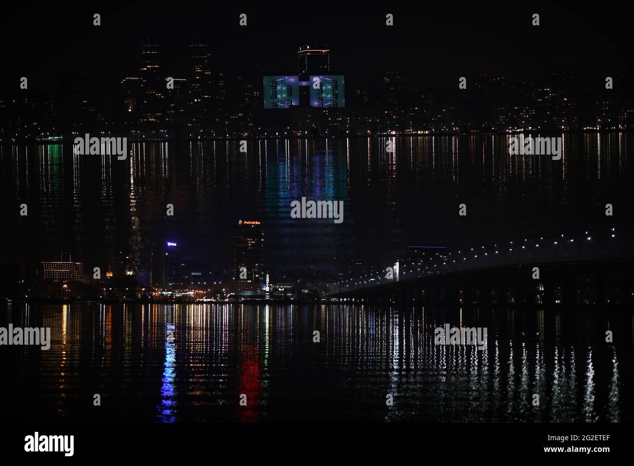 night city as it is beautiful lights on the background of the river ...