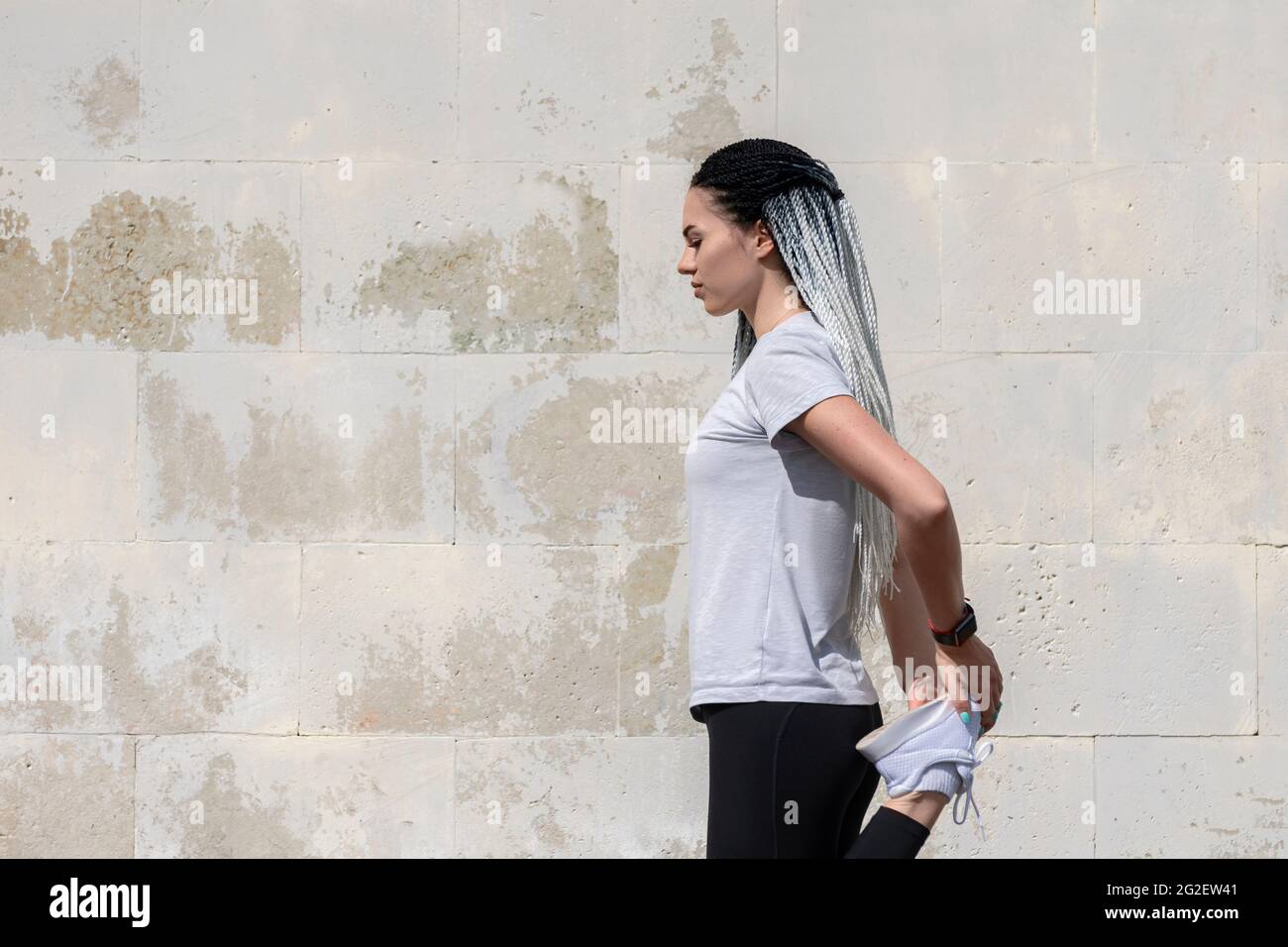 Fitness sport woman with african braids doing stretching exercise over ...